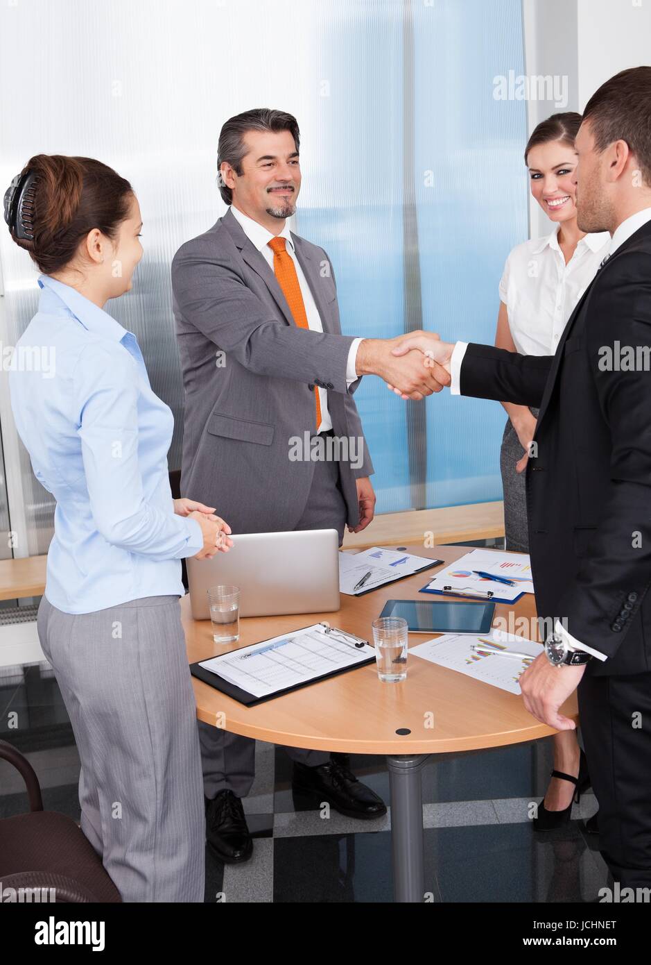 Business people meet shake hands hi-res stock photography and images ...