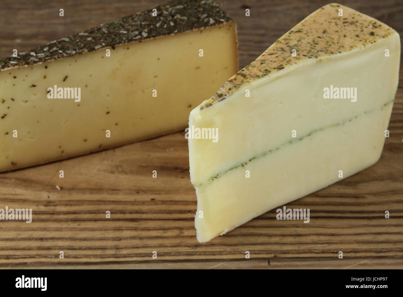 Traditional Swiss Cheese on Wooden Table Close up Stock Photo - Alamy