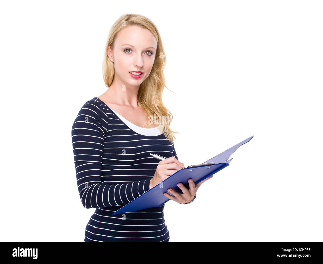 Caucasian woman write on clipboard Stock Photo - Alamy
