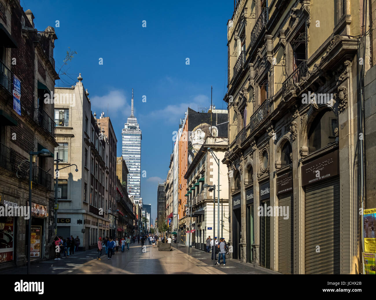 Pedestrian street in Mexico City downtown with Latinoamericana Tower on ...