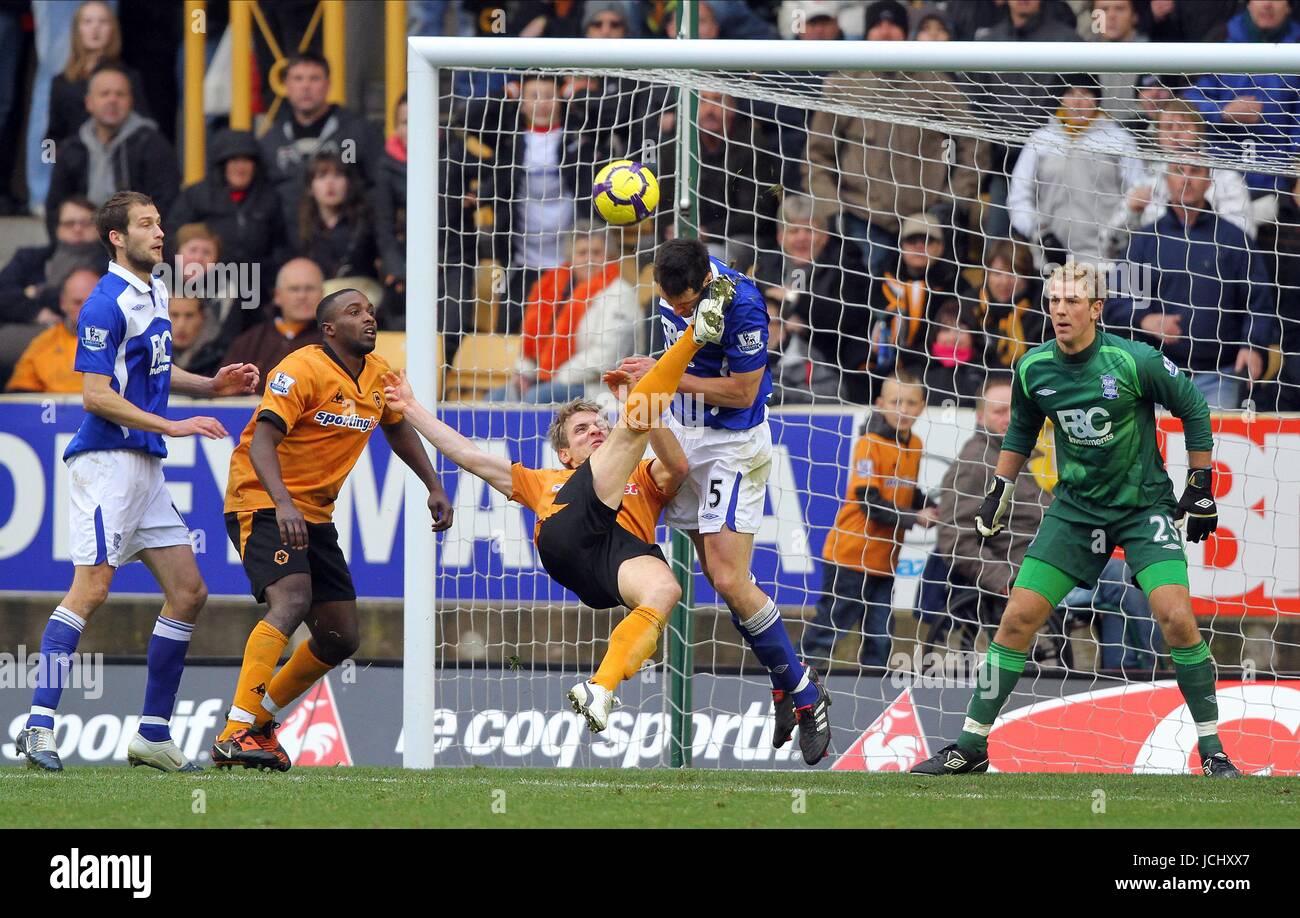 KEVIN DOYLE ATTEMPS A OVER HEAD KICK AS SCOTT DANN DEFENDS WOLVES V ...
