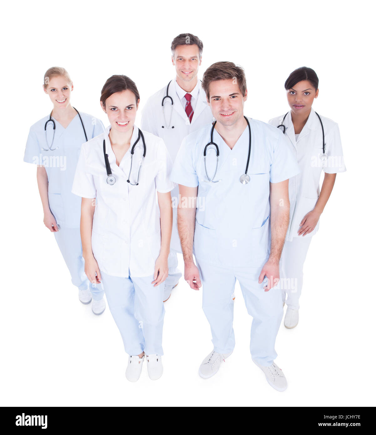 Group Of Happy Doctors Looking Up Over White Background Stock Photo - Alamy