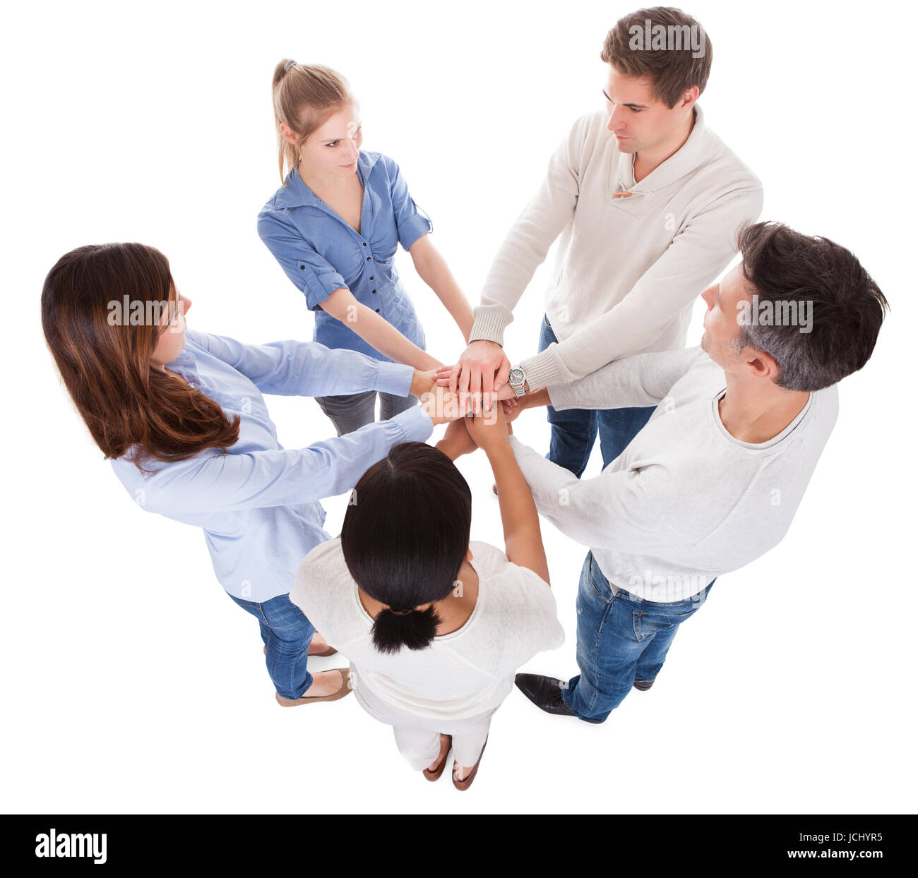 Group Of People Stacking Hand Together Over White Background Stock ...