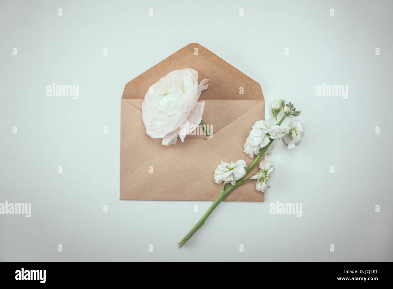 White flowers on an envelope Stock Photo - Alamy