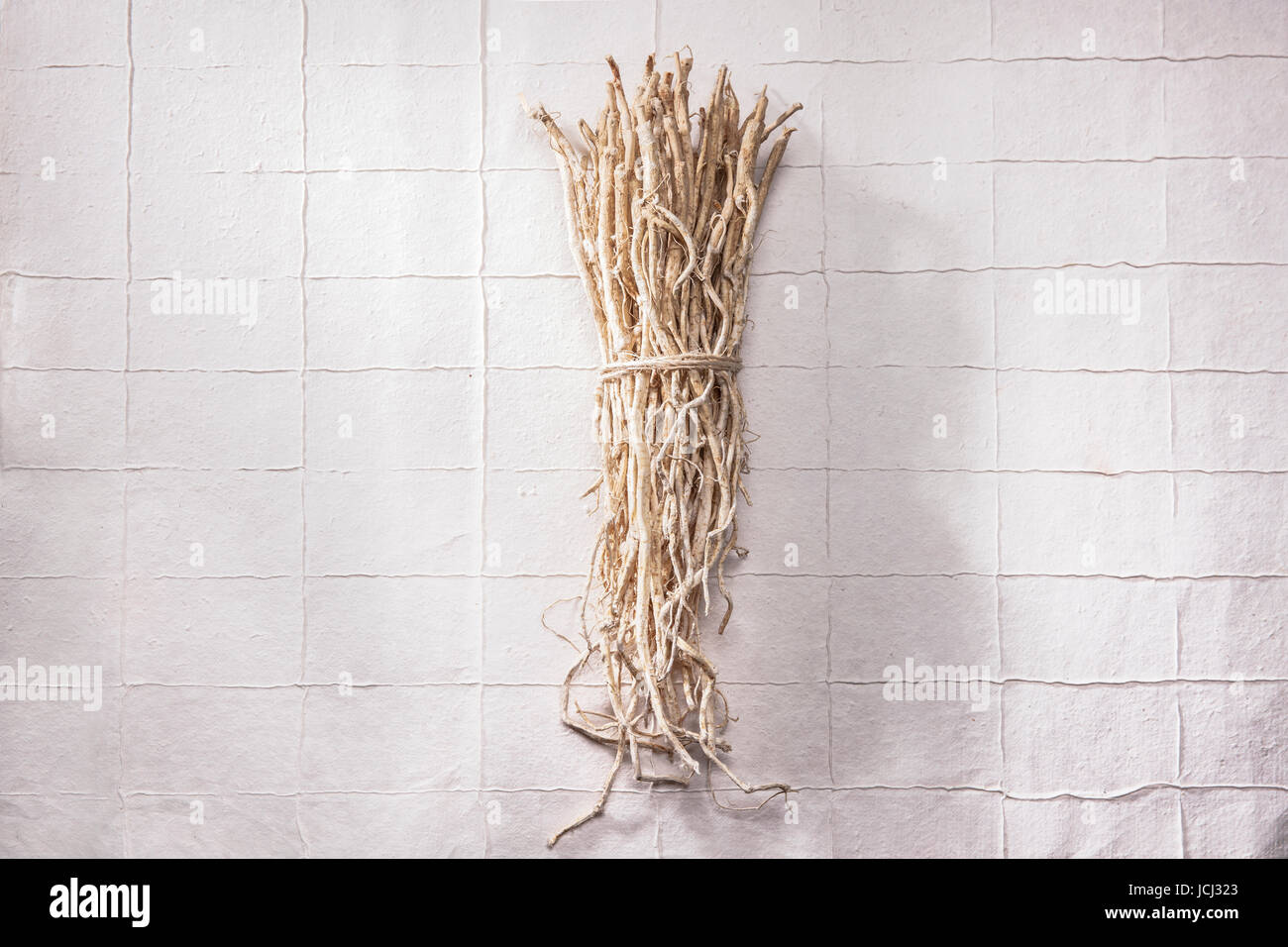 Traditional Korean medicine, milk vetch root Stock Photo - Alamy