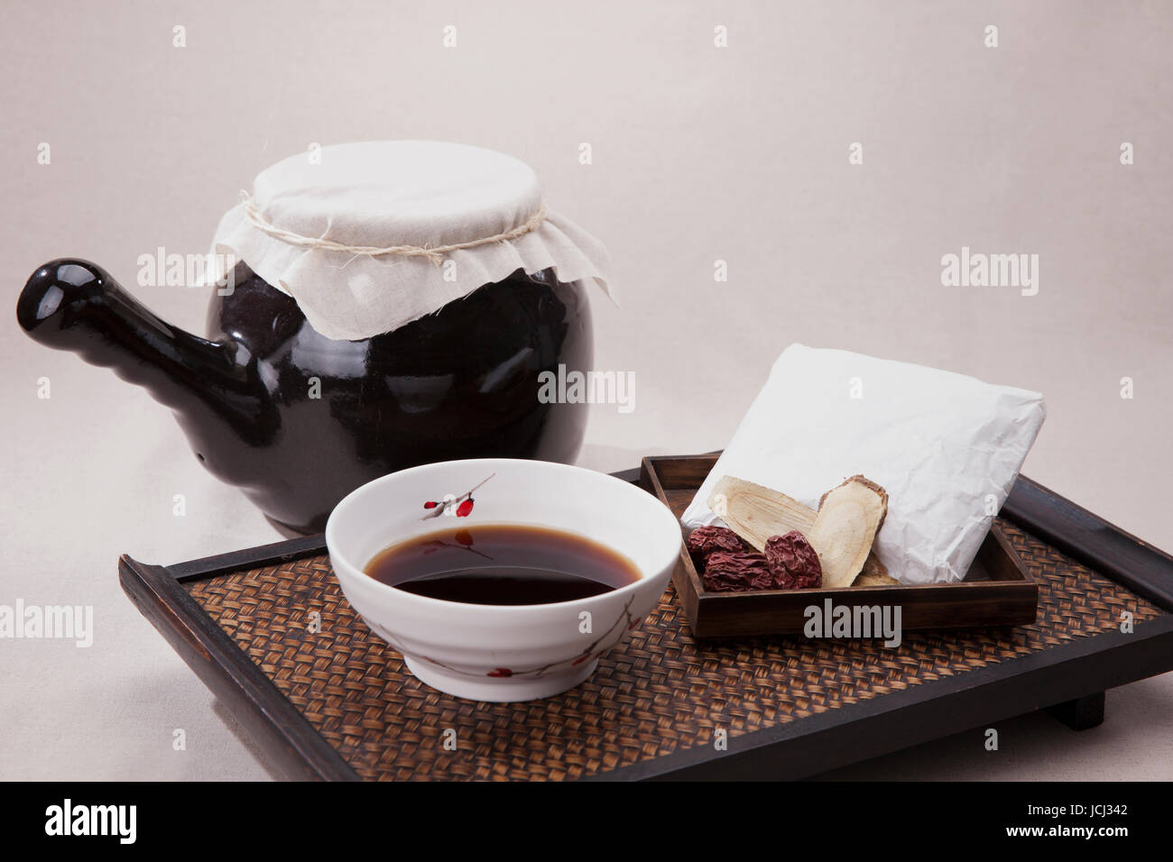 Traditional Korean medicine in a bowl and clay pot Stock Photo - Alamy