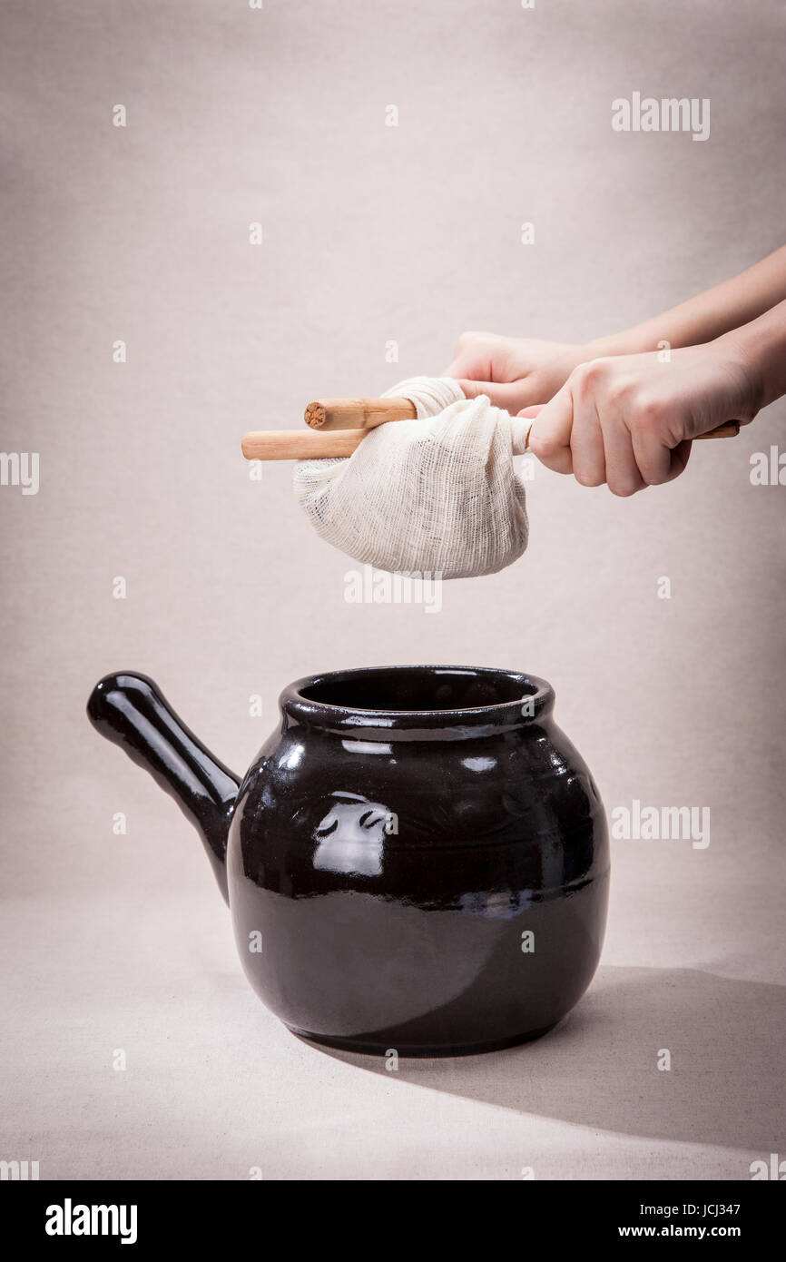 Hands squeezing traditional Korean medicine Stock Photo - Alamy