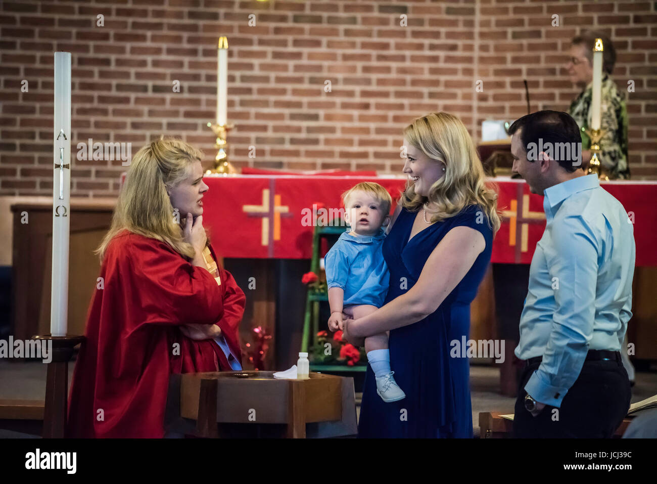 Church ceremony, baptism of young children. Parents, Grandparents ...