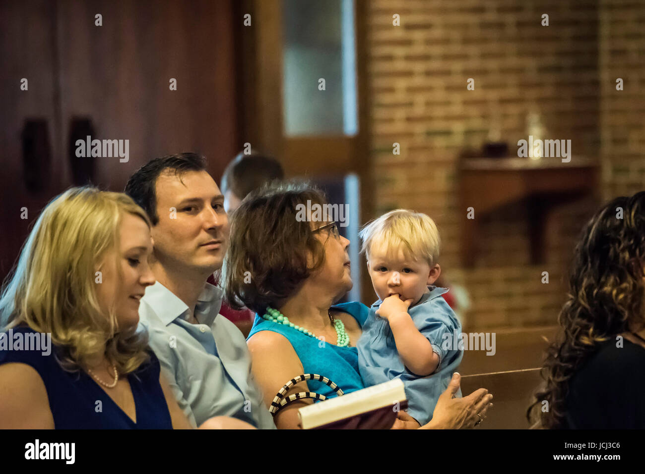 Church ceremony, baptism of young children. Parents, Grandparents ...