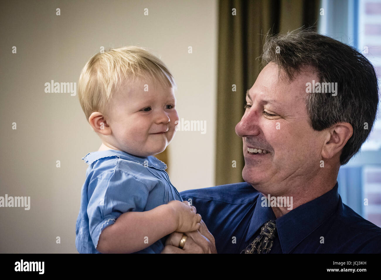 Church ceremony, baptism of young children. Parents, Grandparents ...