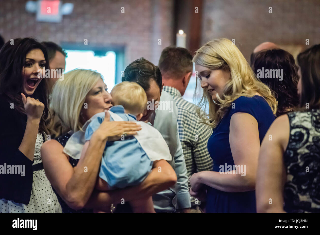 Church ceremony, baptism of young children. Parents, Grandparents ...