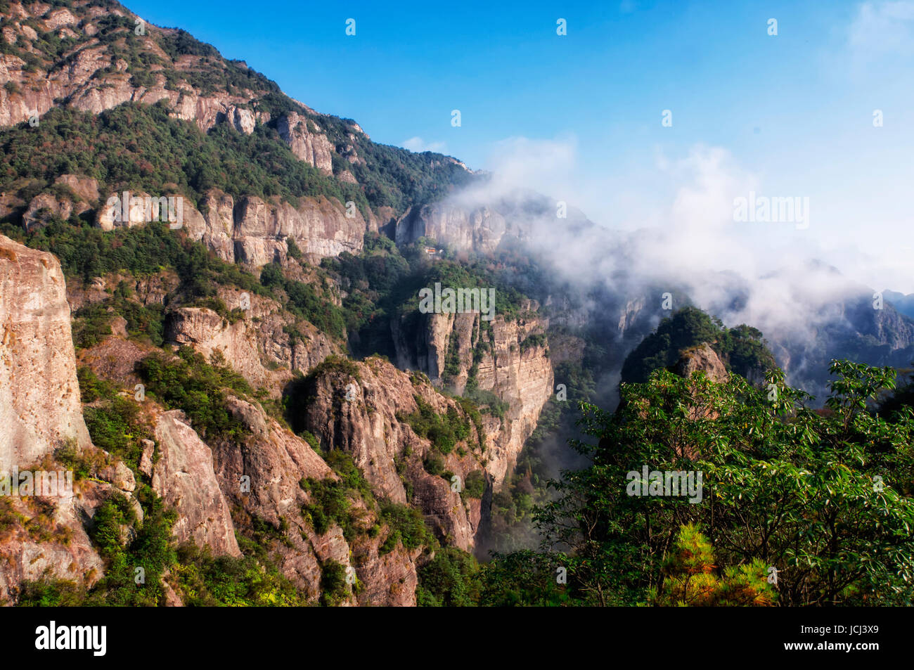 Early morning clouds hanging over Yandangshan or Yandang mountains in ...