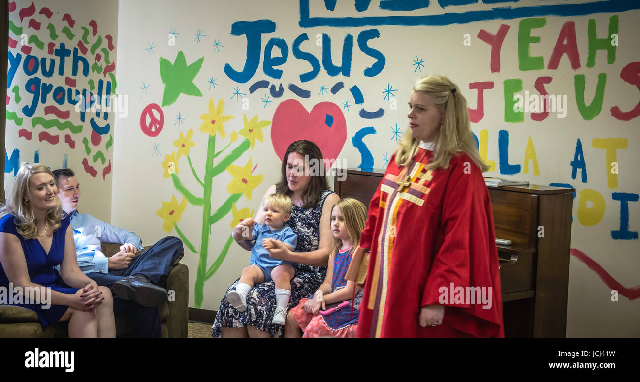 Church ceremony, baptism of young children. Parents, Grandparents ...