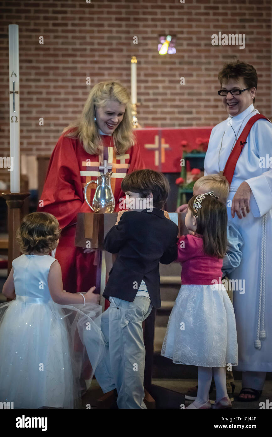 Church ceremony, baptism of young children. Parents, Grandparents ...