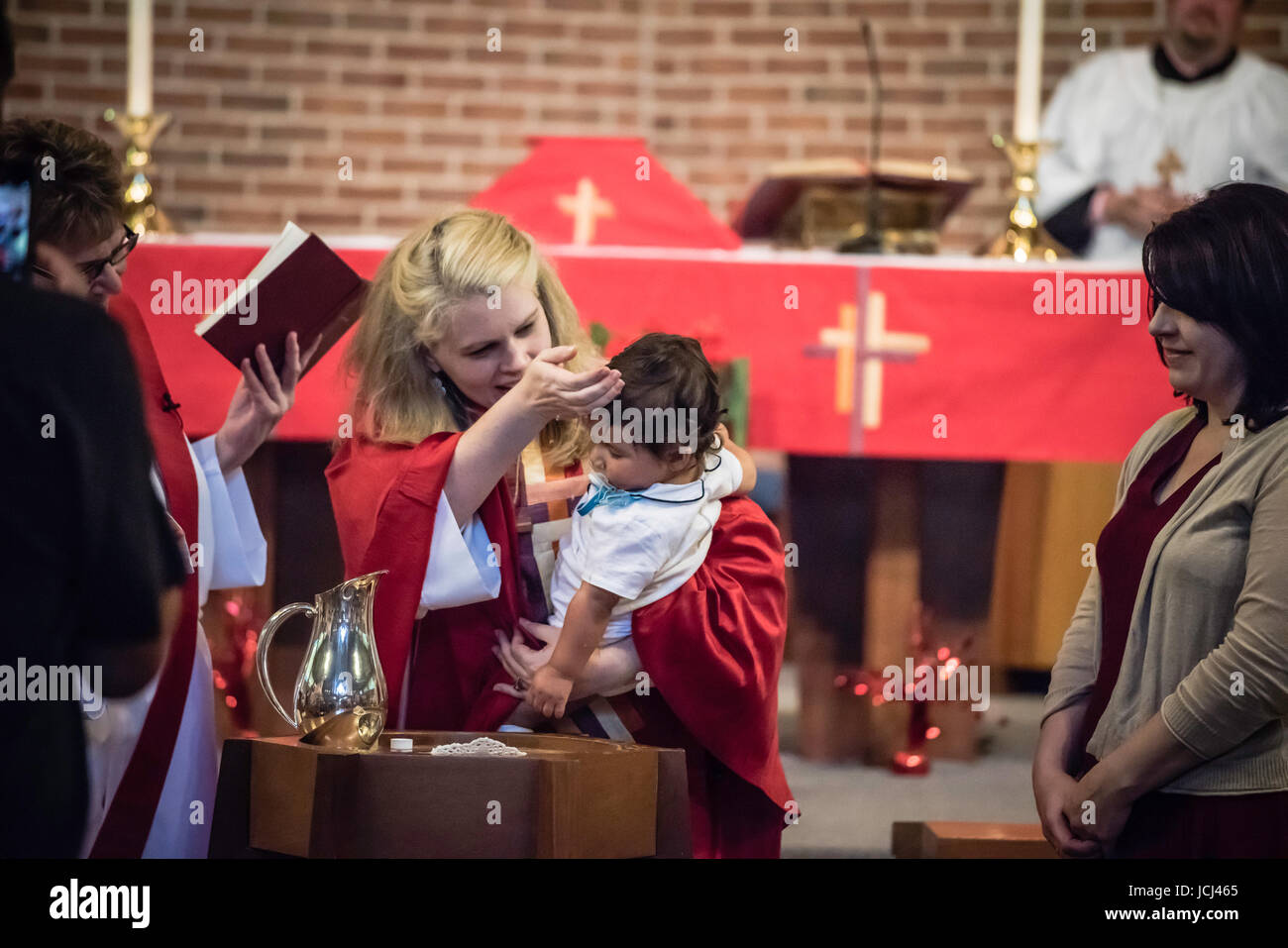 Church ceremony, baptism of young children. Parents, Grandparents ...