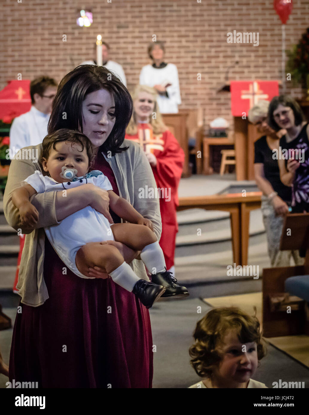 Church ceremony, baptism of young children. Parents, Grandparents ...