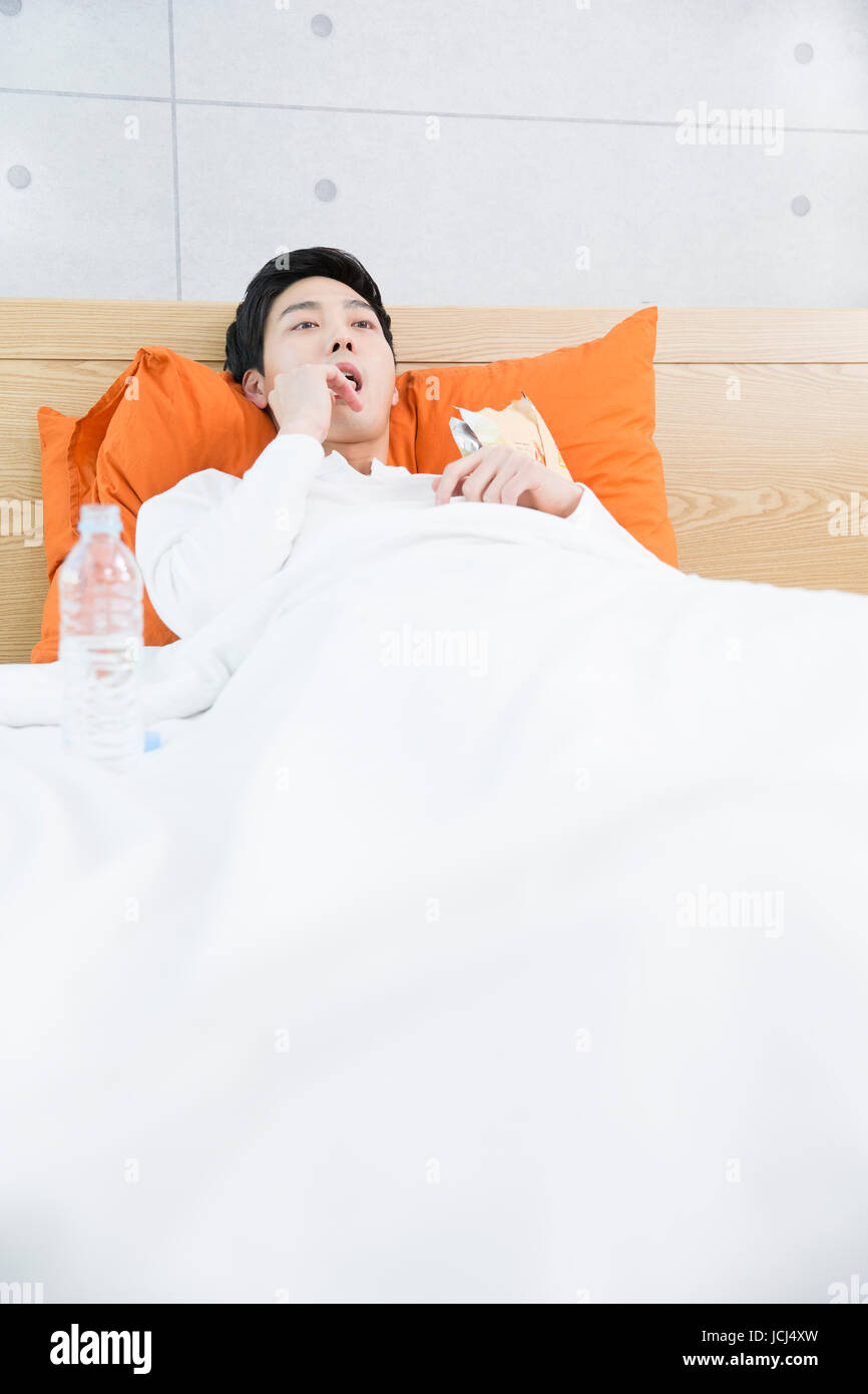 Eating snack hi-res stock photography and images - Alamy