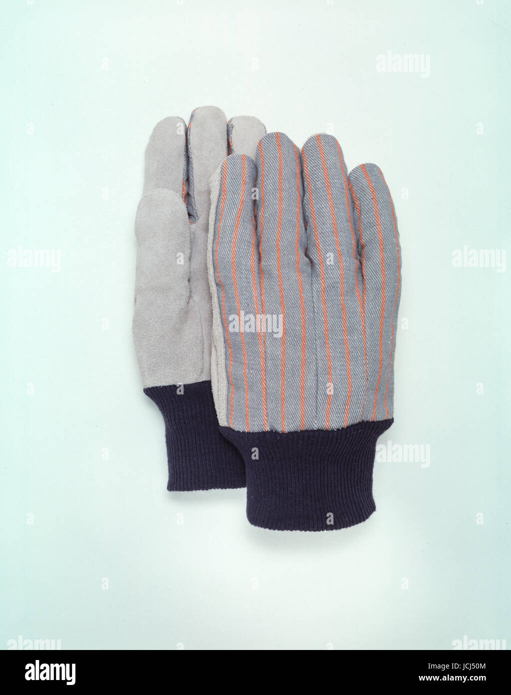 Industrial strength denim work gloves Stock Photo - Alamy