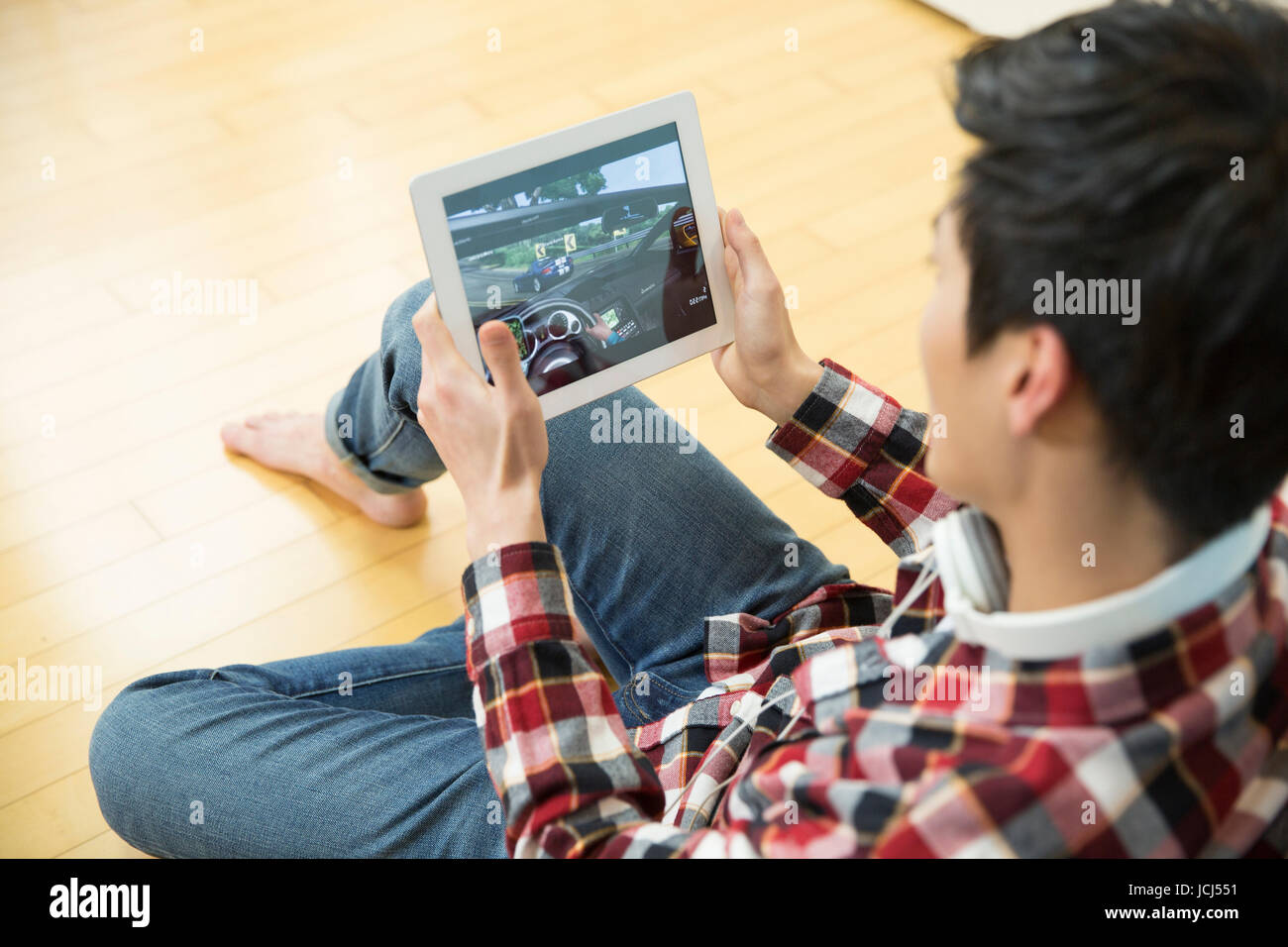 Tablet game person hi-res stock photography and images - Alamy