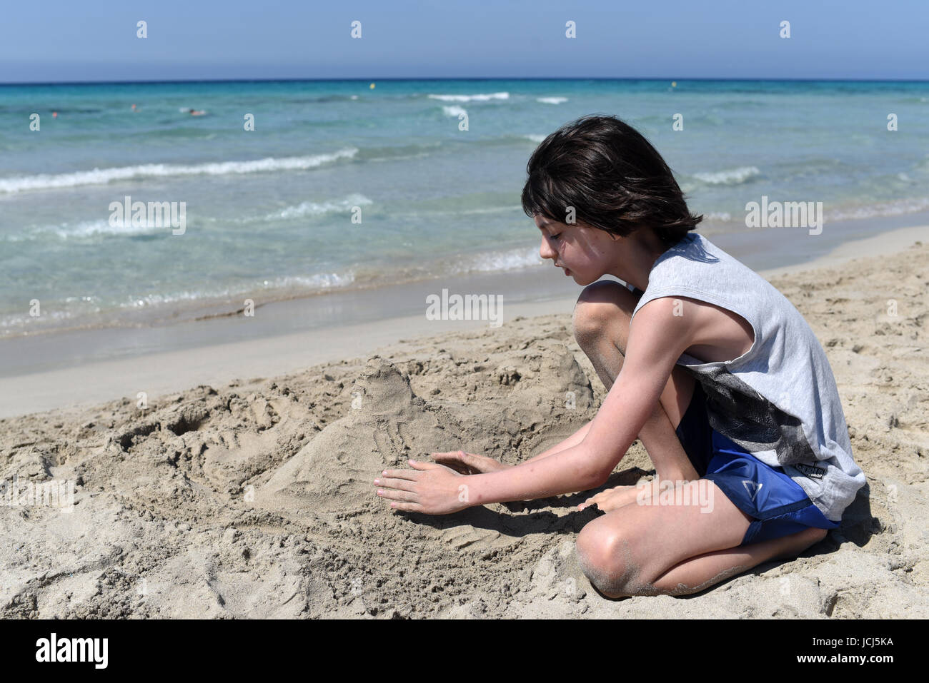 Children playing sand sculpture High Resolution Stock Photography and ...