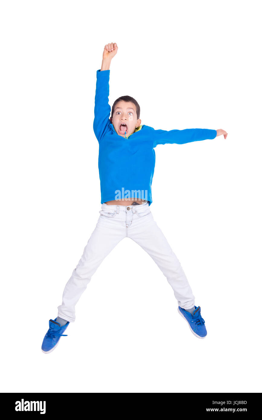 Young boy jumping isolated in white Stock Photo - Alamy