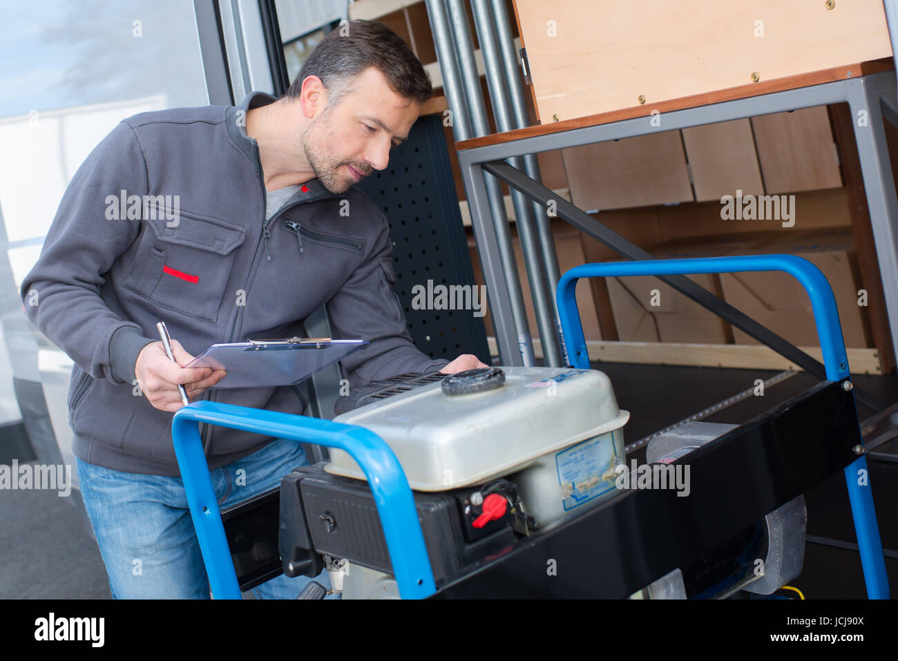 man tries to start generator Stock Photo - Alamy