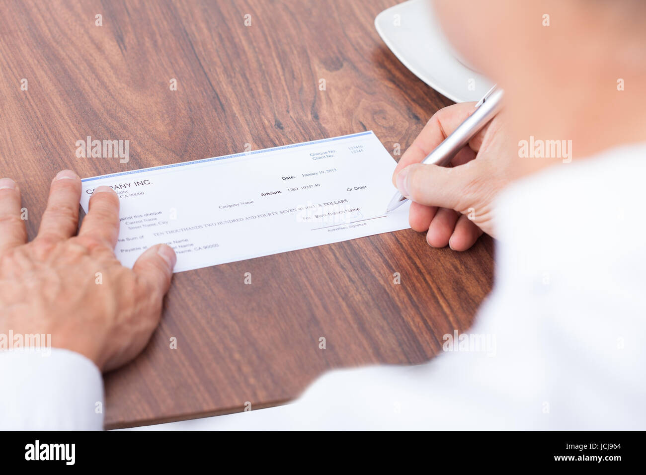 Cashier check bank note hi-res stock photography and images - Alamy