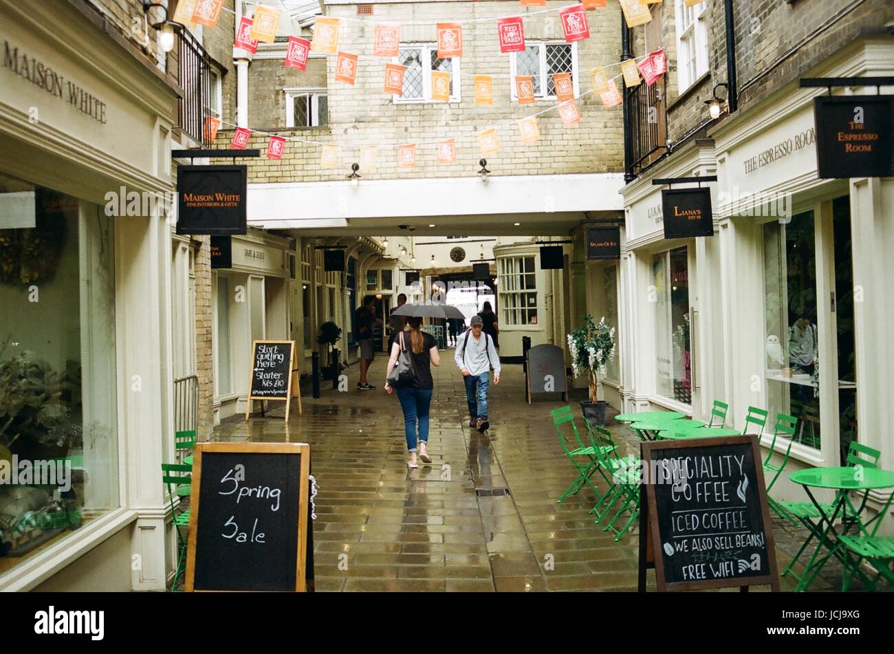 the wet walk through town Stock Photo - Alamy