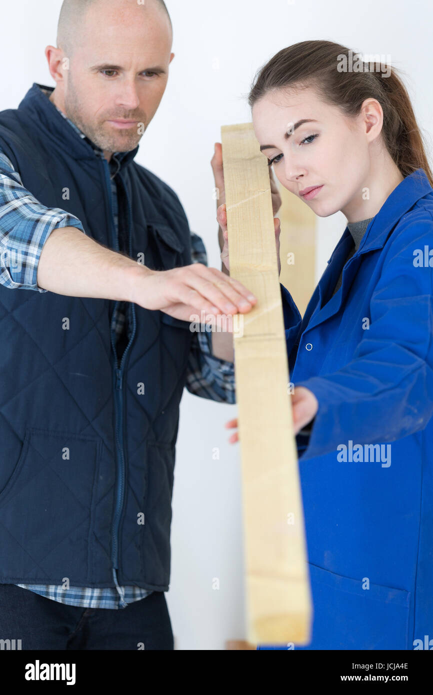 a carpenter and his pretty apprentice Stock Photo - Alamy