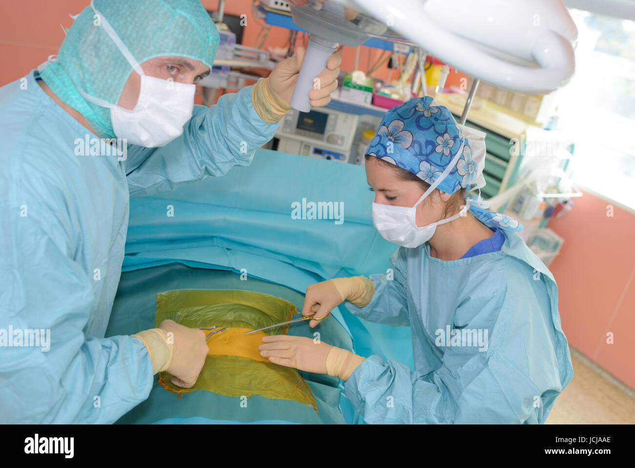 young surgery team in the operating room Stock Photo - Alamy