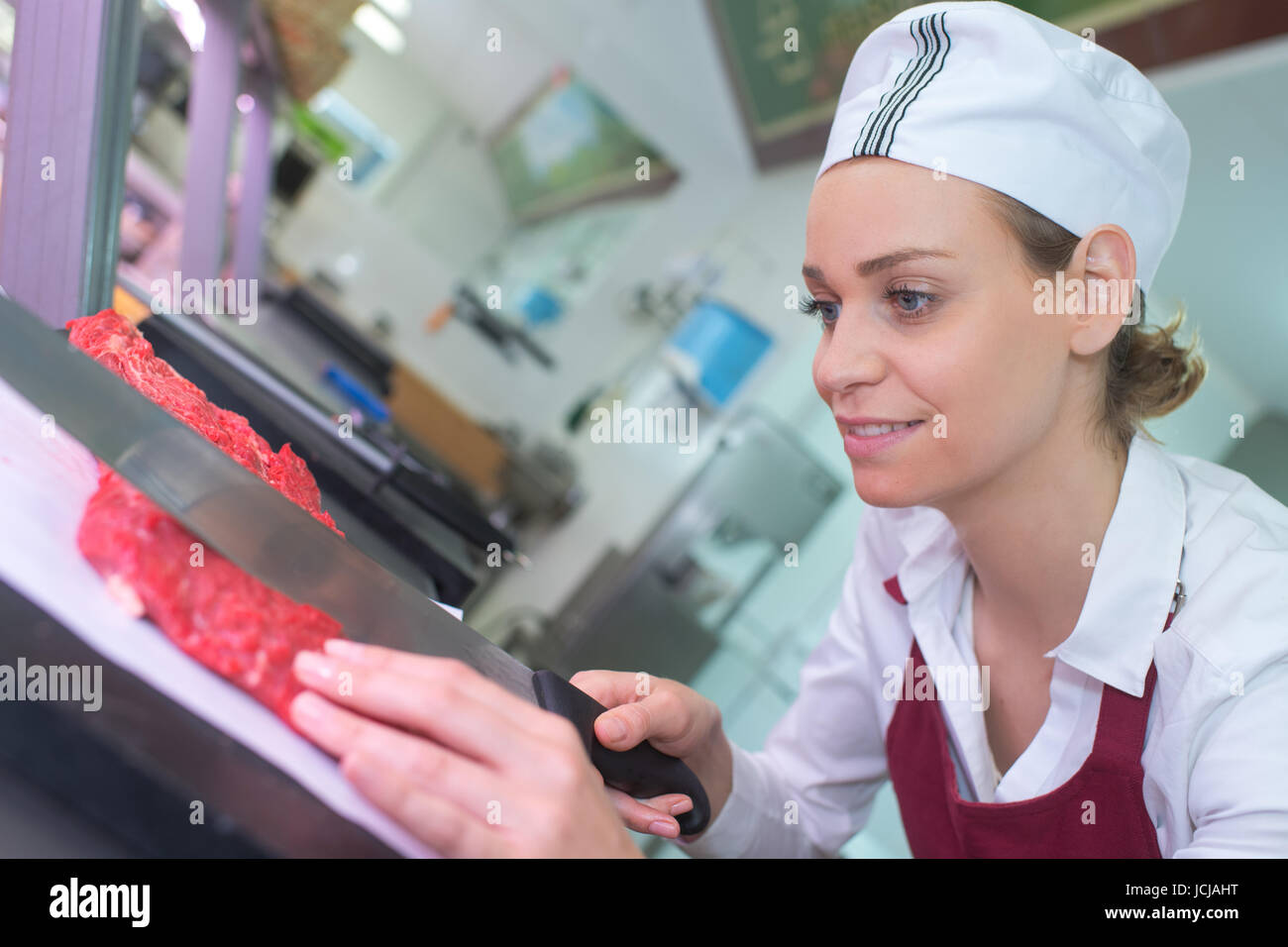 Female butcher working hi-res stock photography and images - Alamy