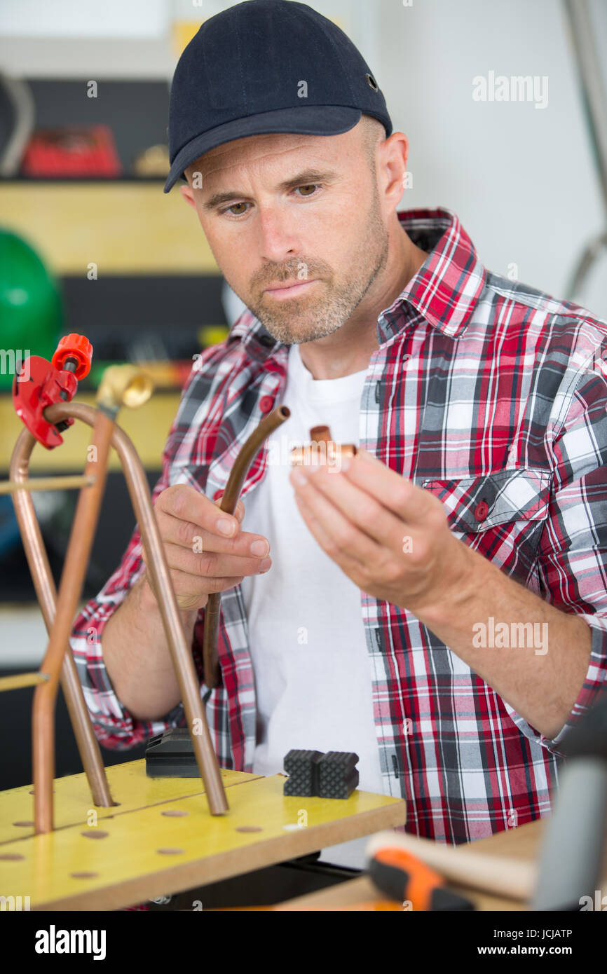 worker cutting the copper pipe of air conditioner Stock Photo - Alamy
