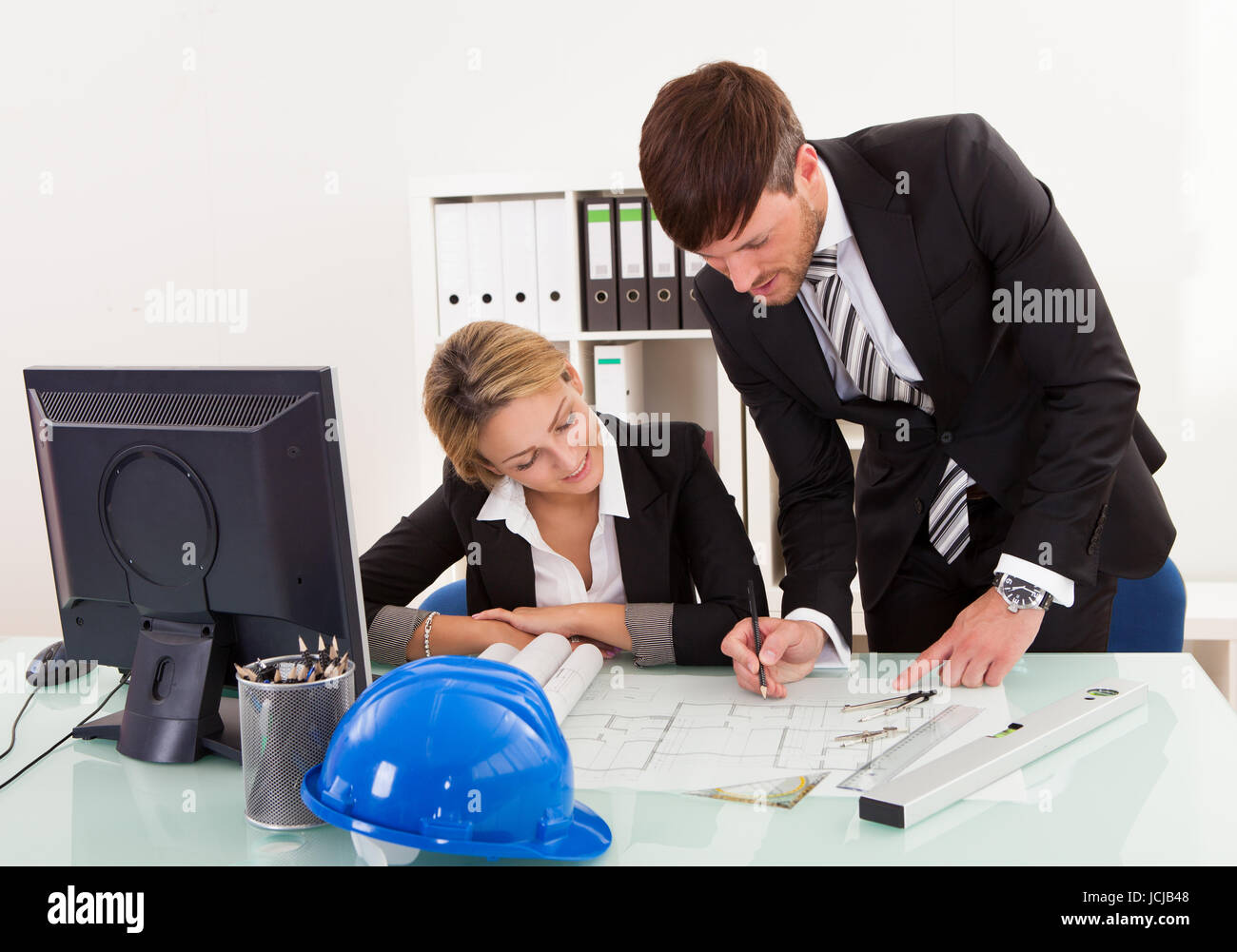 Construction plans revised and signed for formal submission Stock Photo ...
