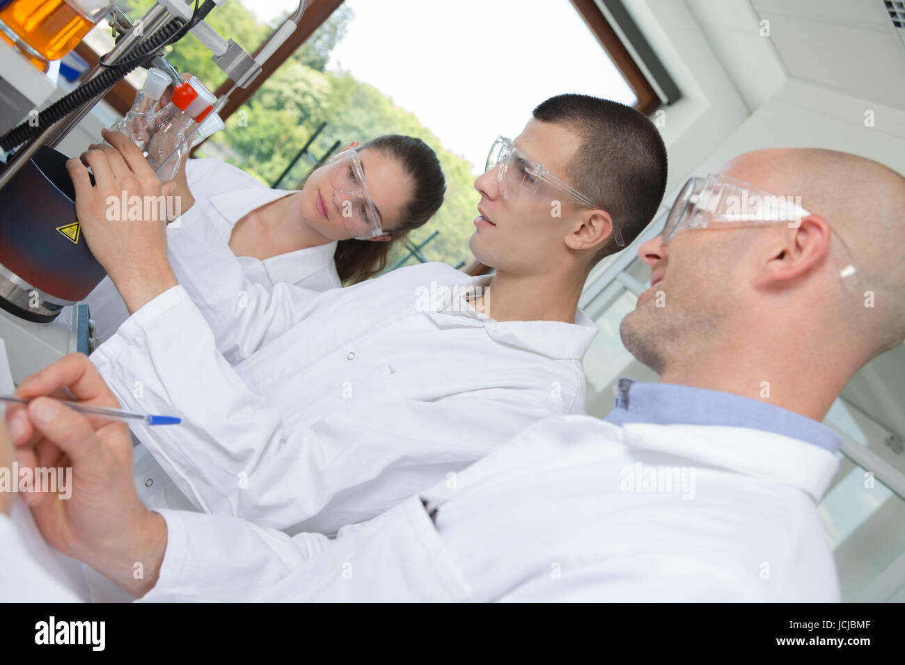 young students group in bright chemistry lab Stock Photo - Alamy