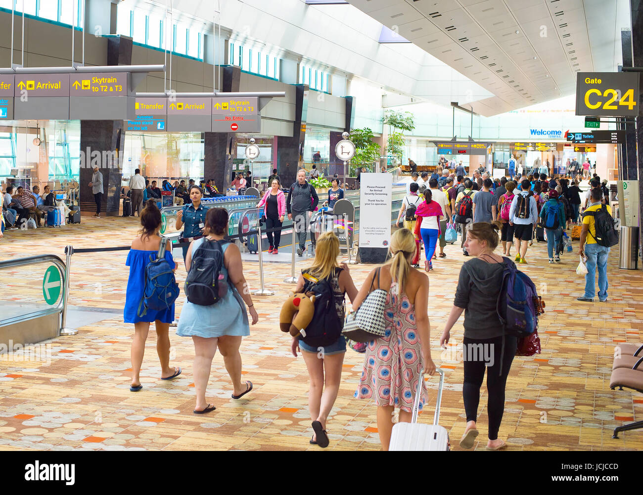 SINGAPORE - JANUARY 13, 2017: People in Changi International Airport ...