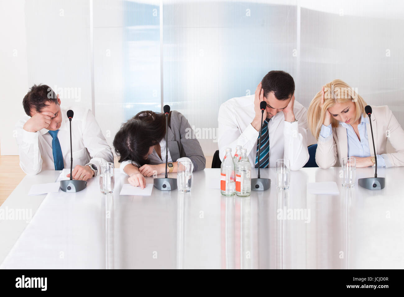 Bored Business People In The Conference Meeting Stock Photo - Alamy