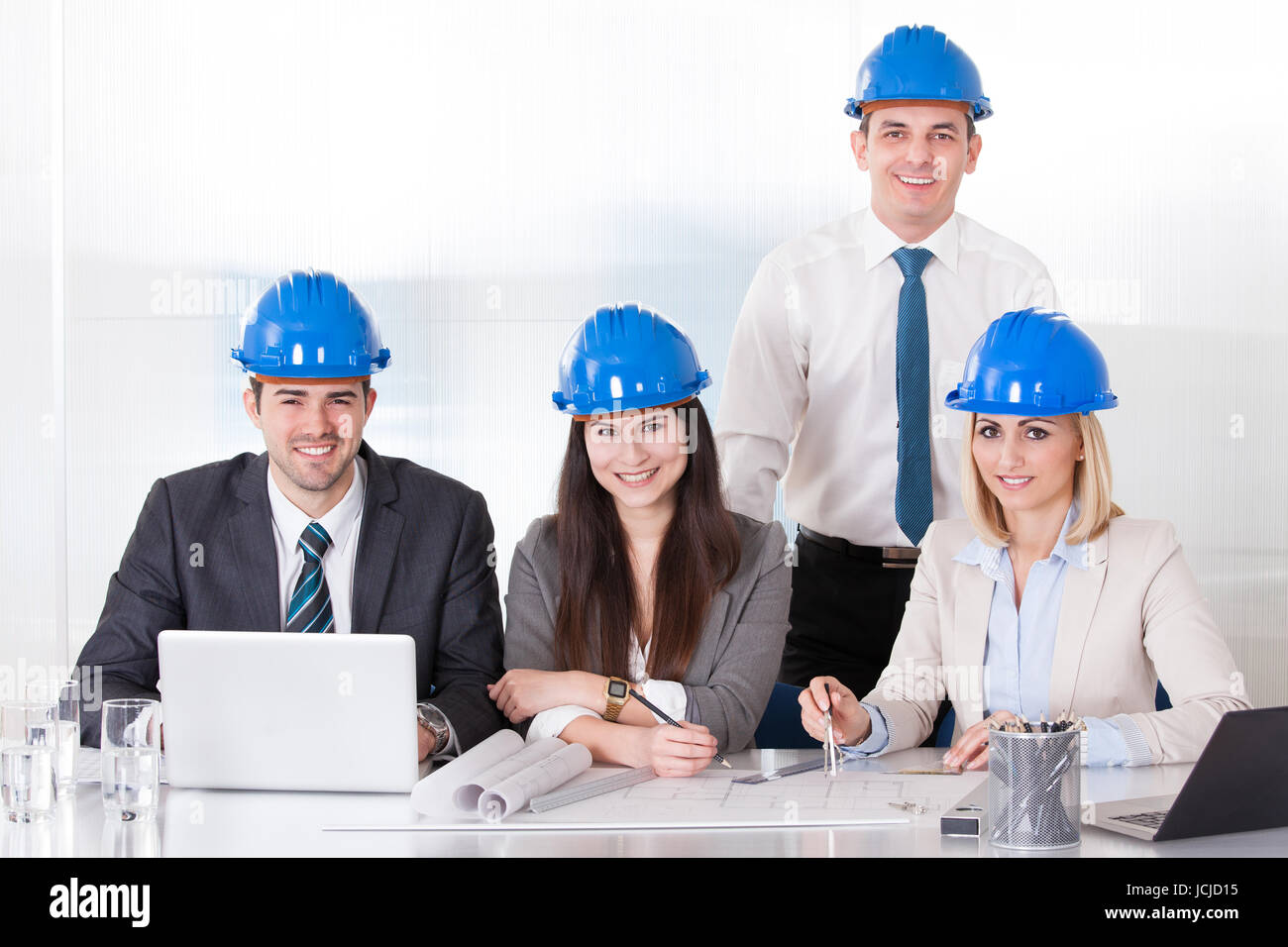 Group Of Architect People Working On Project Stock Photo - Alamy