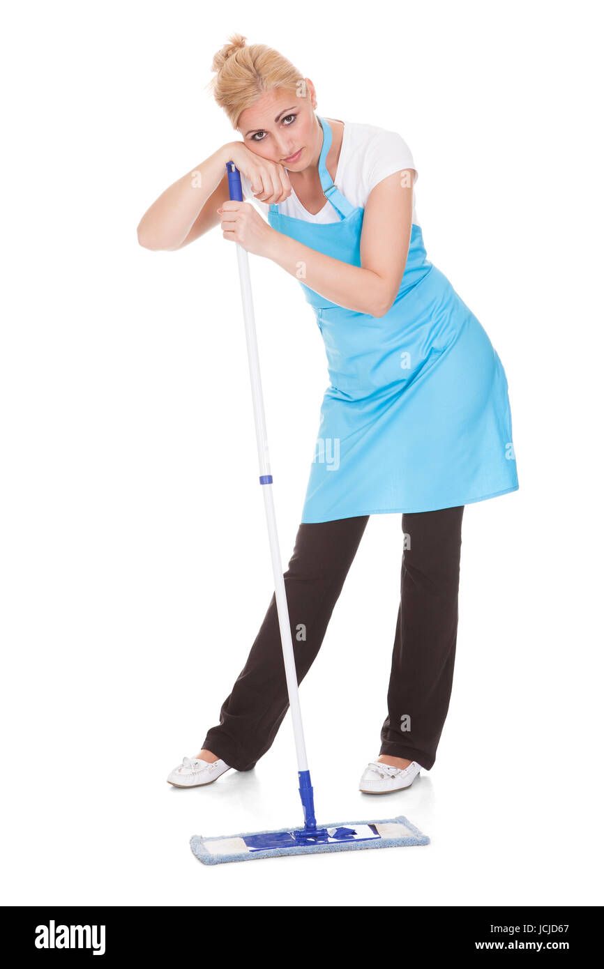 Cleaning lady tired broom Cut Out Stock Images & Pictures - Alamy