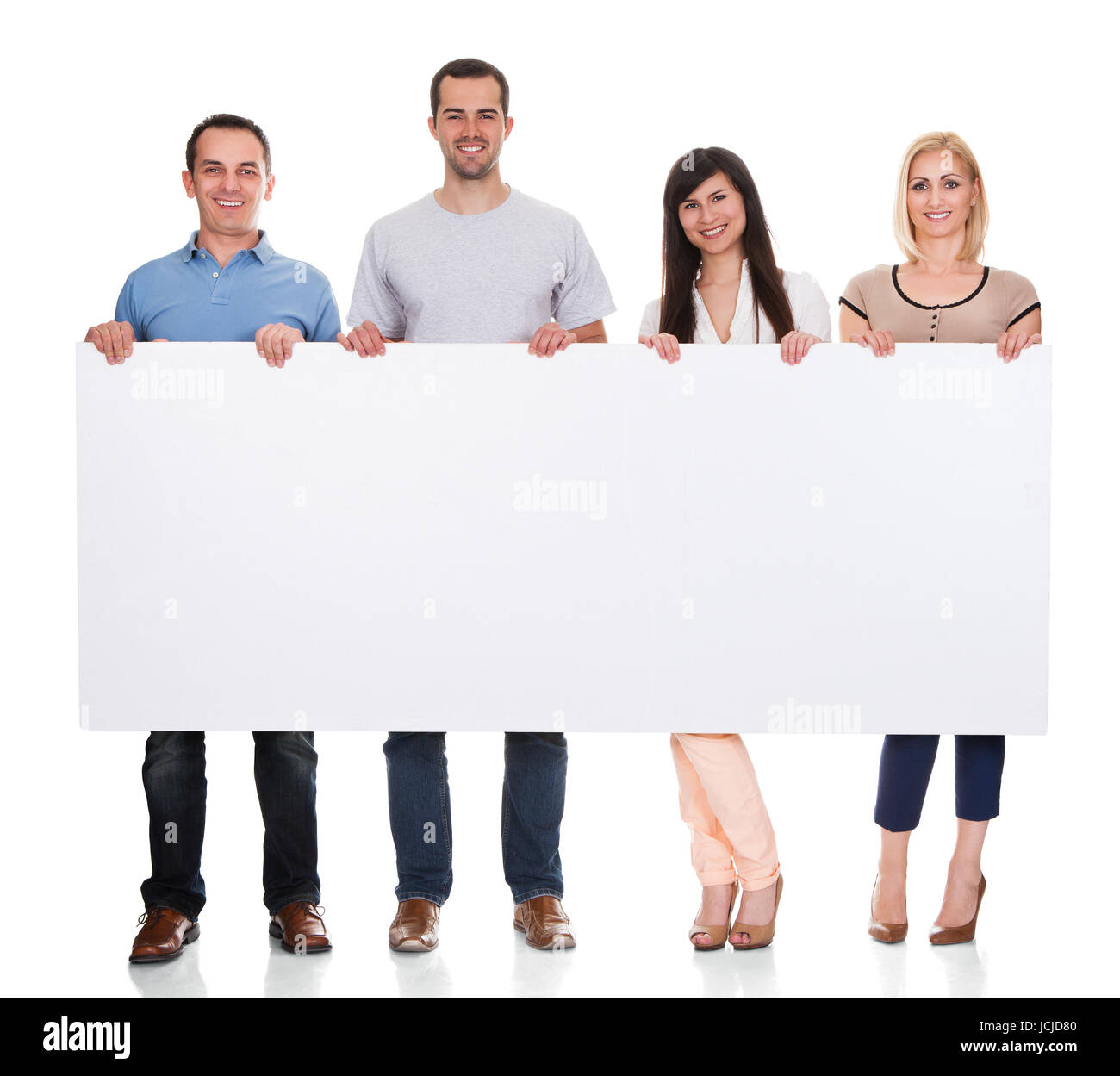 Group Of Friends Holding Placard On White Background Stock Photo - Alamy