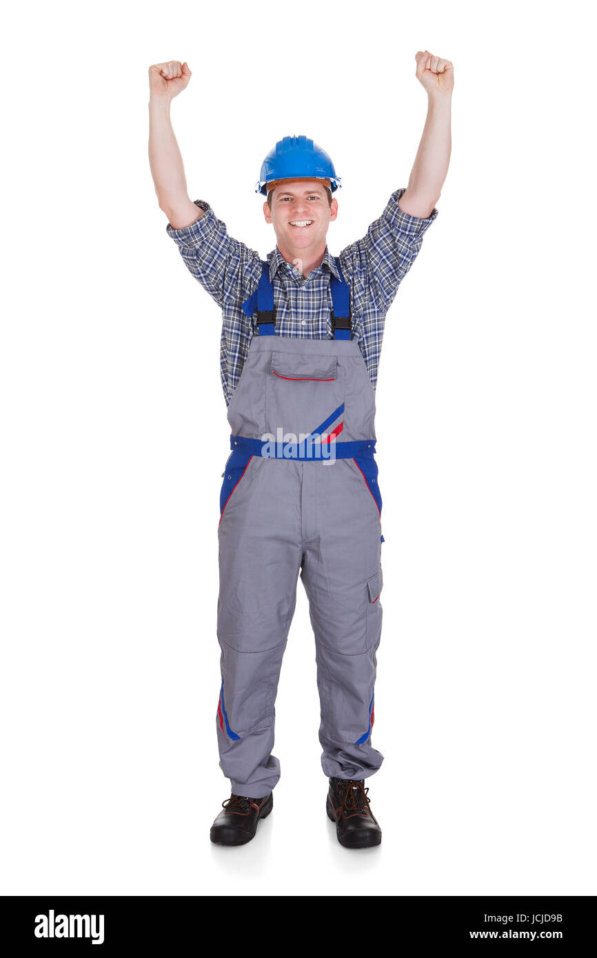 Portrait of Excited Male Technician raising hands Isolated Over White ...