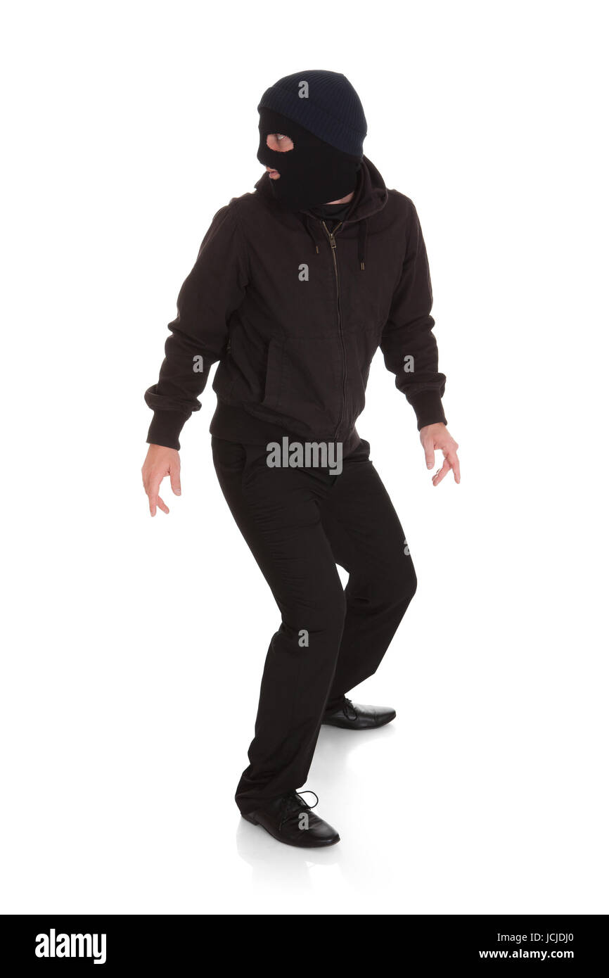 Man Wearing Mask Looking Back Over White Background Stock Photo - Alamy