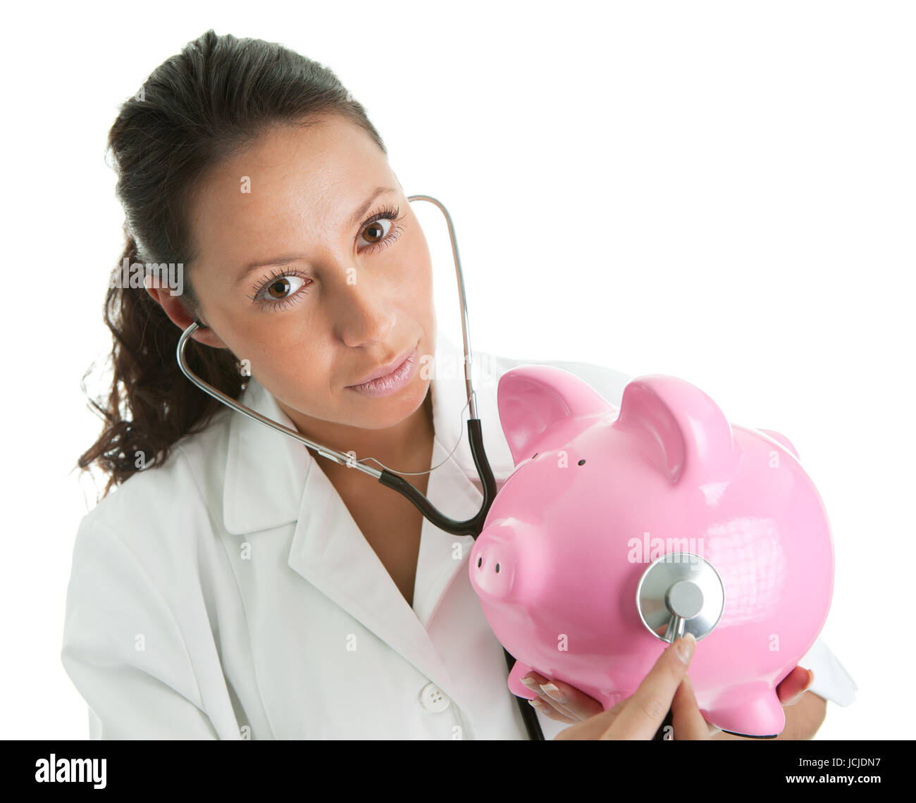 Doctor inspecting piggy bank. Isolated on white Stock Photo - Alamy