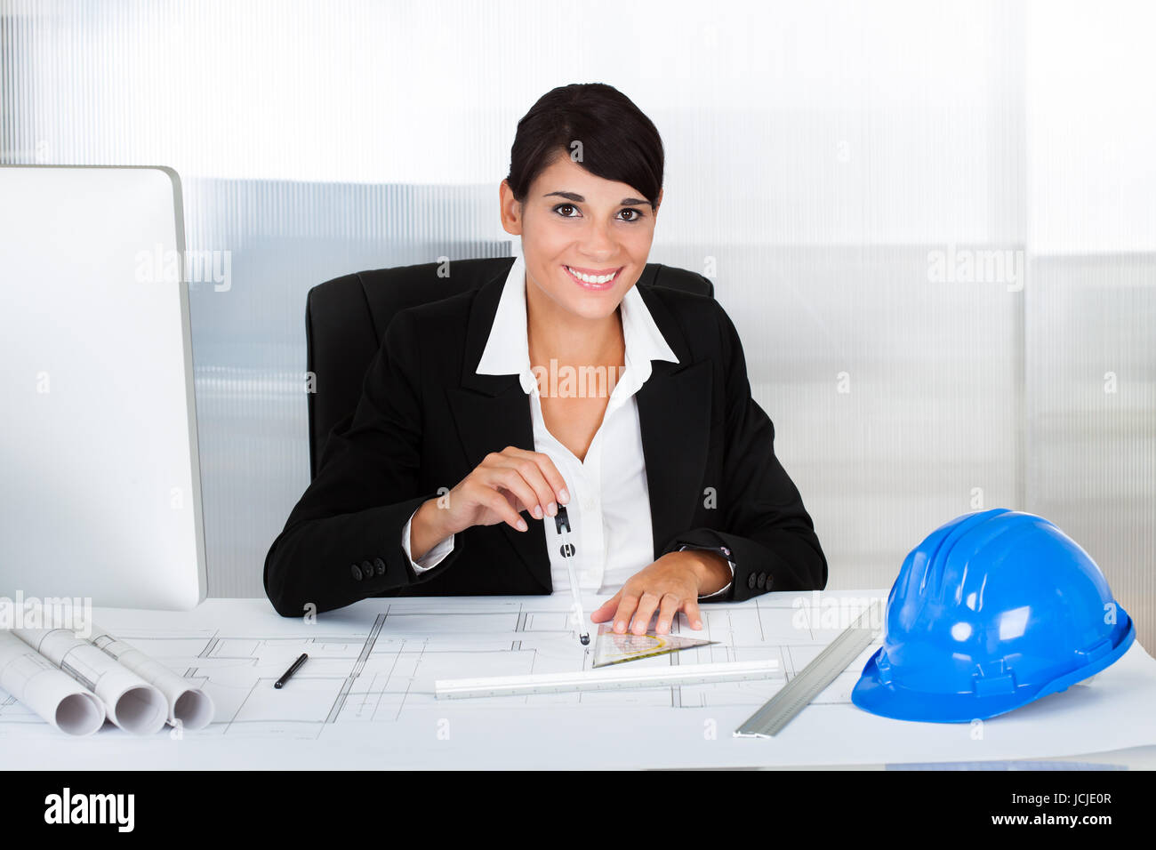 Female architect drafting blueprint ruler hi-res stock photography and ...