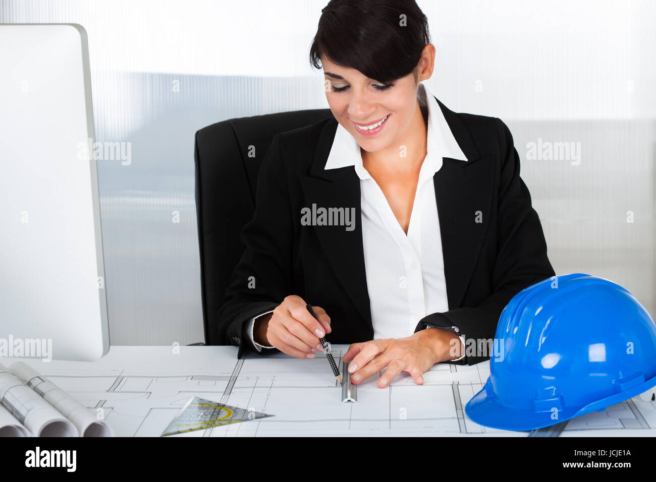 Female architect drafting blueprint ruler hi-res stock photography and ...