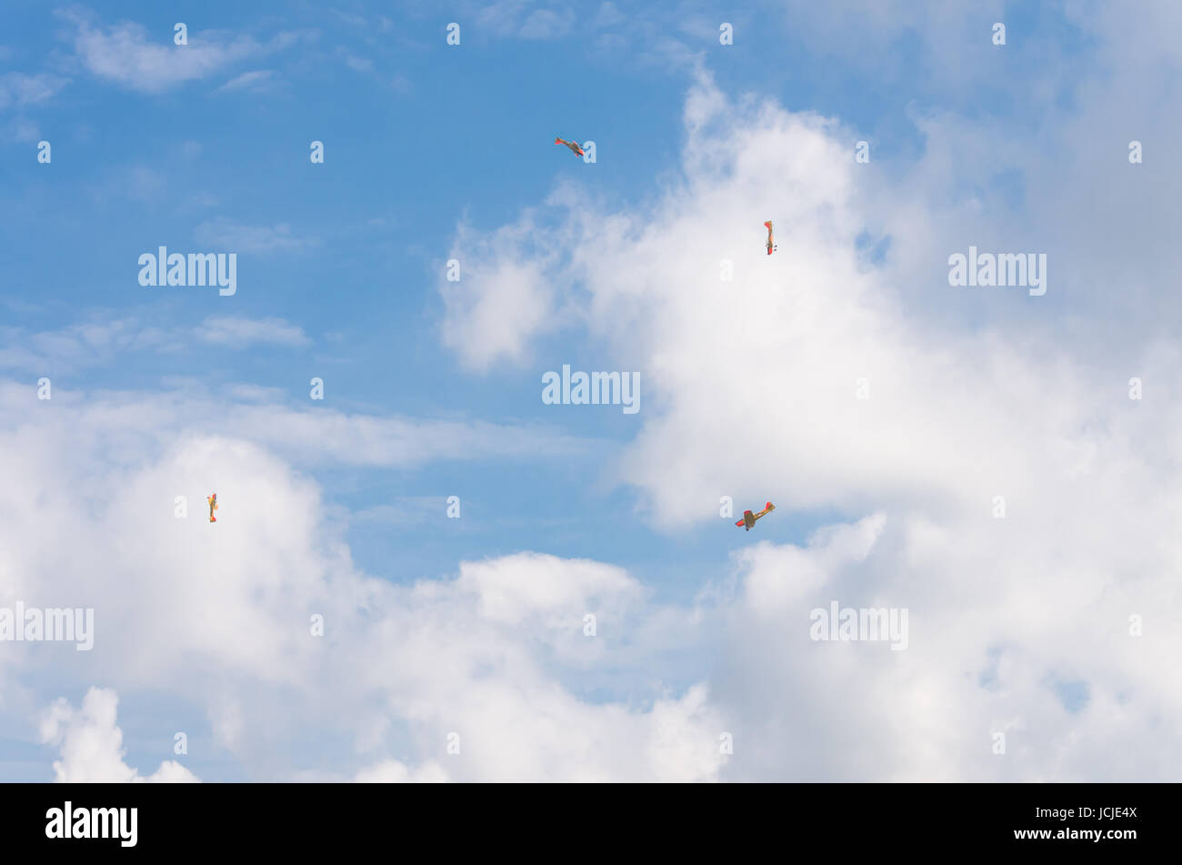 four propeller aircrafts making a looping at an air show Stock Photo ...