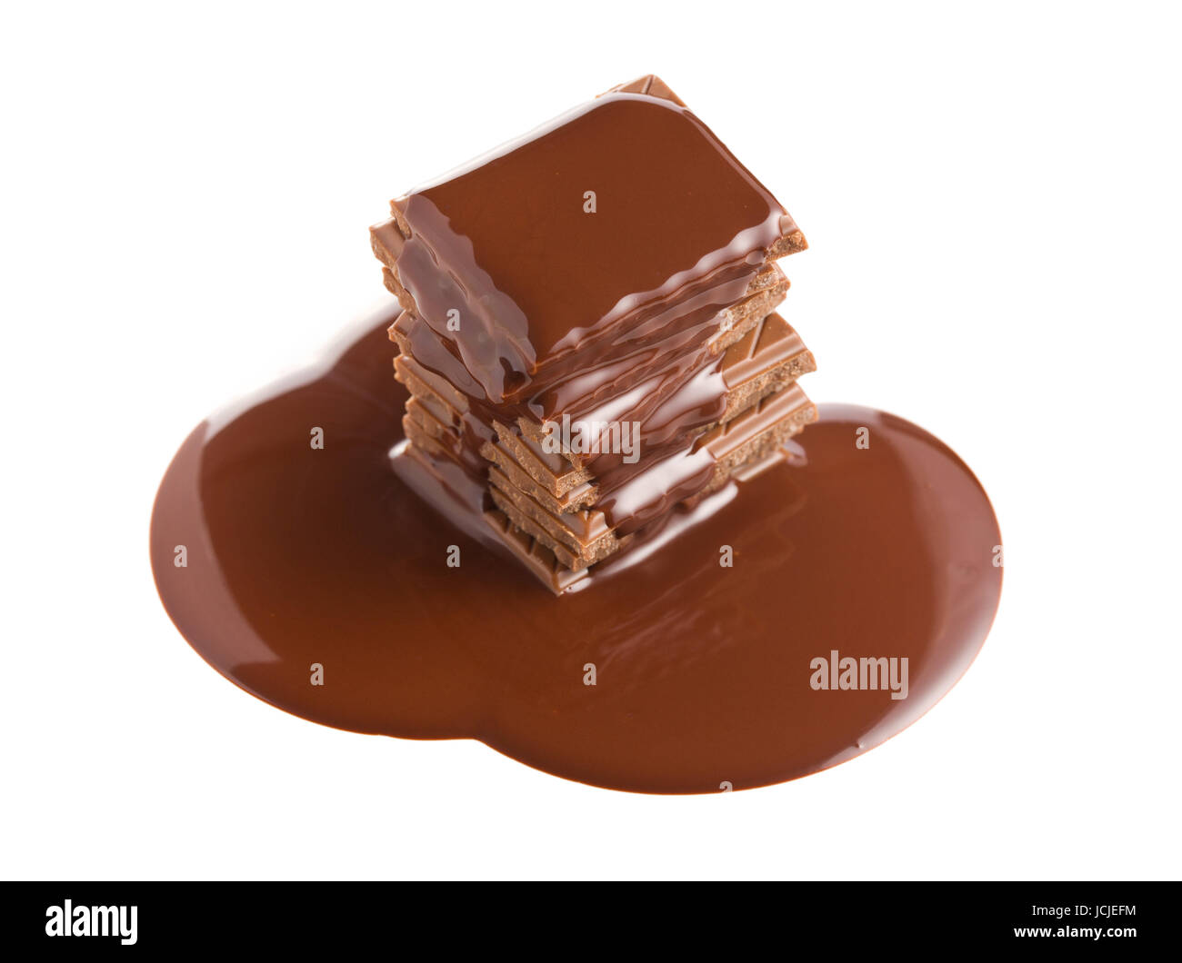 pouring chocolate on the chocolate bar Stock Photo - Alamy