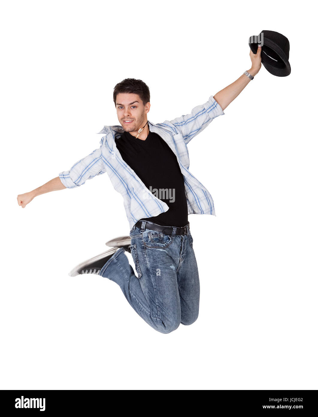 Young dancer in mid air jump with arms outstretched Stock Photo - Alamy