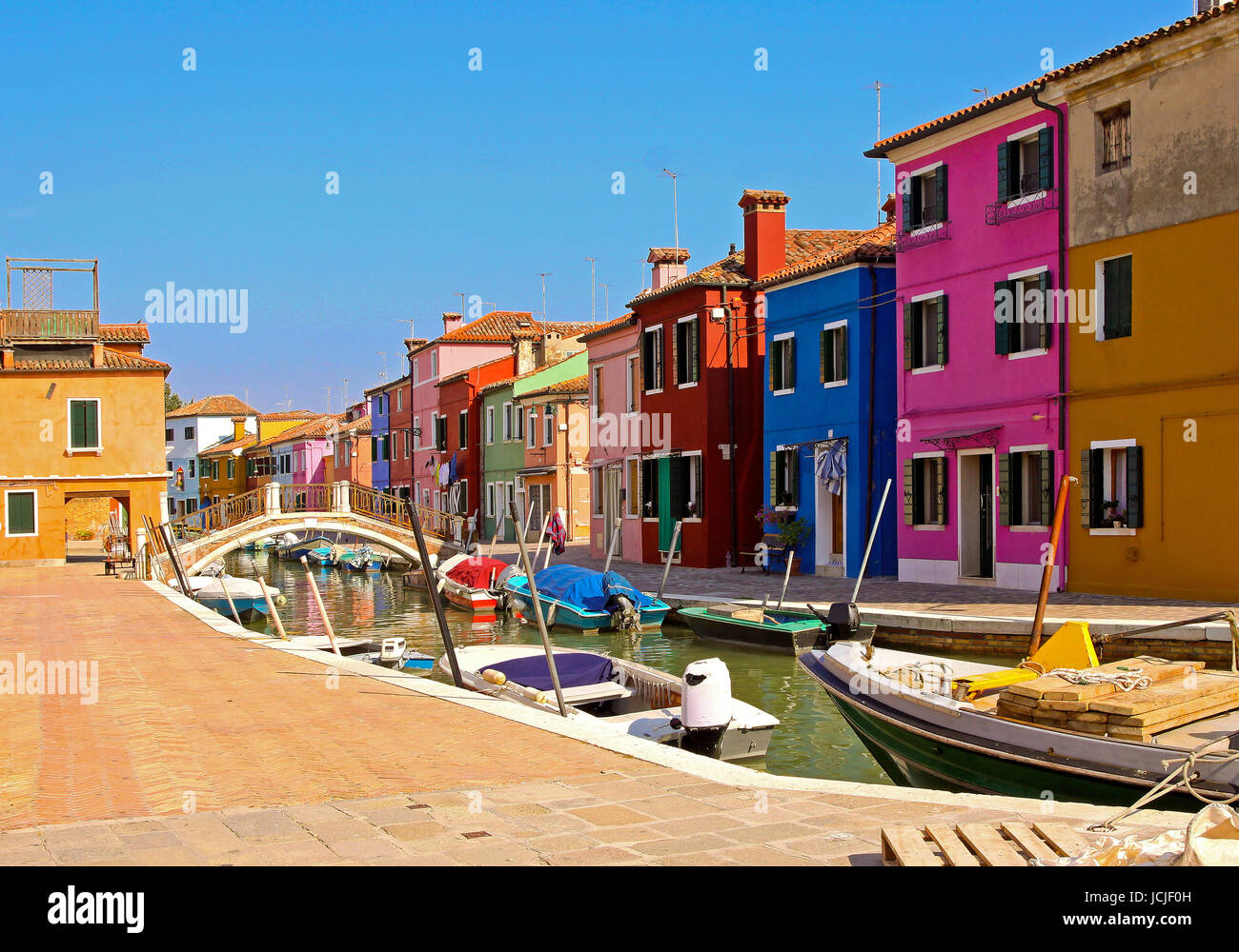 Beautiful Burano landscape with bridge over canal Stock Photo - Alamy