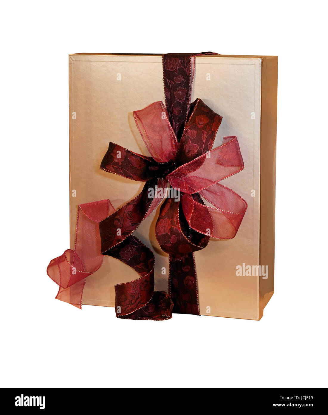 Golden gift box with big bow isolated Stock Photo - Alamy