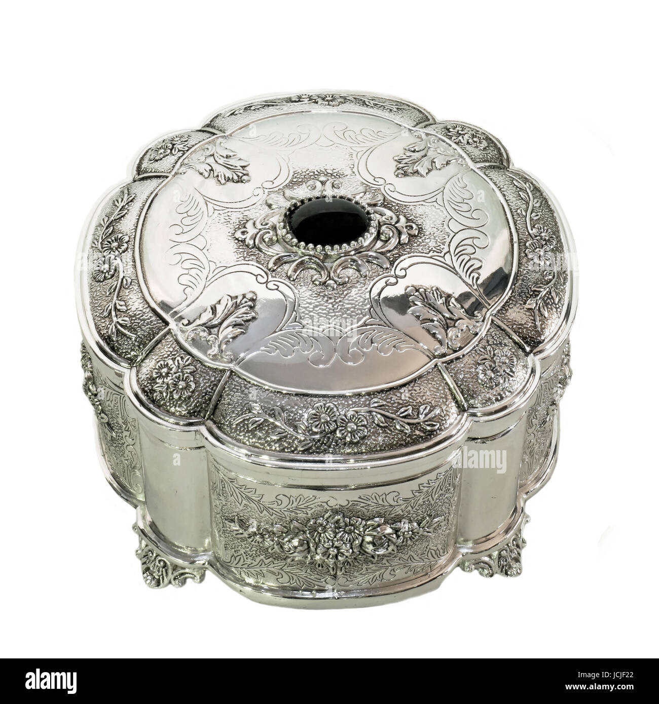 round and shiny silver box with ornaments Stock Photo - Alamy